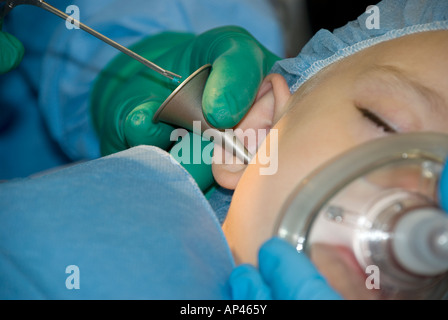Hospital surgeon and nurse with patient undergoing endoscopy ...