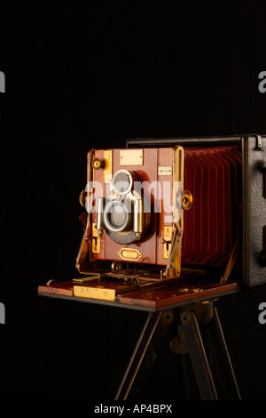 Antique large format camera with bellows on wooden tripod Stock Photo ...