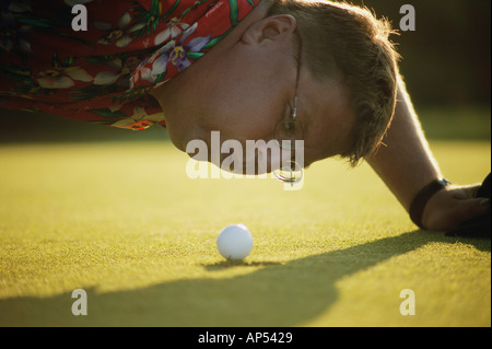 The gimme putt - golf concepts Stock Photo - Alamy