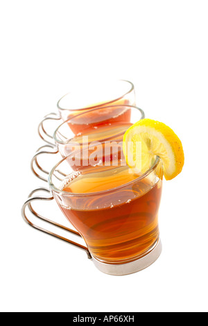 Three glass cups of tea Shallow dof Stock Photo - Alamy