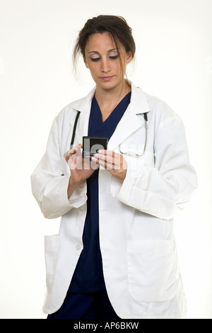 Lady doctor pager Stock Photo - Alamy