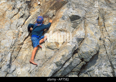 boy climbing rock barefoot Stock Photo: 153555760 - Alamy