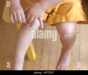 Child with Band Aid on Knee Close Up Stock Photo - Alamy