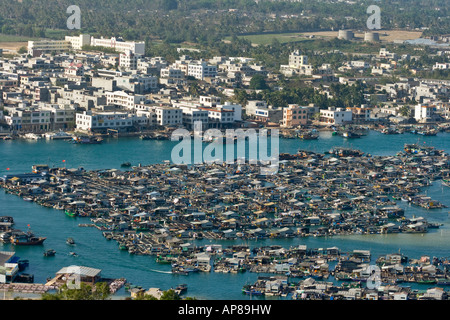 Floating fishing village and fishing boats in Cat Ba Island, Vietnam ...