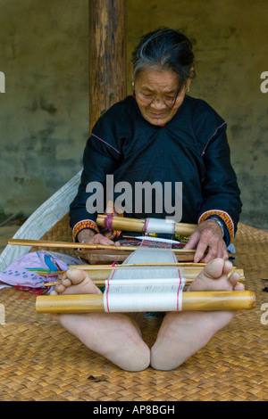 Li Woman Sewing on Hand Loom Hainan Island China Stock Photo - Alamy