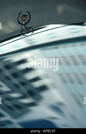 Reflection of buildings in car hood Stock Photo - Alamy