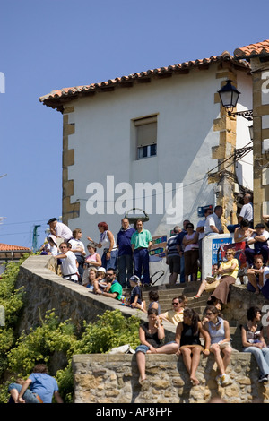 Basque people sit and enjoy the sunshine Puerto Viejo de Algorta Basque ...