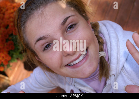 Teenage girl reaching out her hand to teenage boy Stock Photo - Alamy