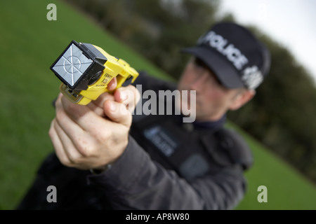 Humberside police firearms officer demonstrates the Taser gun Stock ...