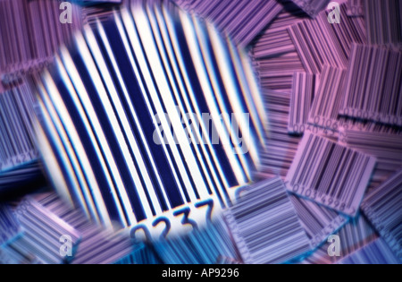 a bar code under a magnifying glass Stock Photo - Alamy