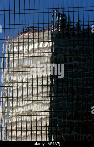 Reflection of Alpha Tower, in windows of Hyatt Regency Hotel Stock ...
