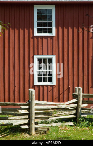 Side of old batton board building shop with white framed windows Stock ...