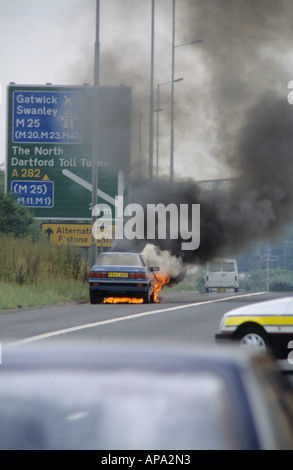 Car on fire on the A2 Stock Photo - Alamy