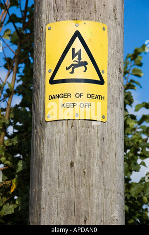 Sign. Health and Safety, 'DANGER of DEATH', on a perimeter fence to a ...
