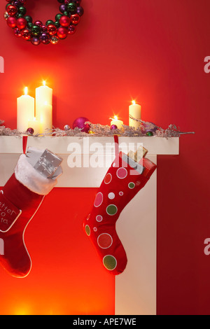 Christmas stockings hanging over the fireplace at midnight on Christmas ...