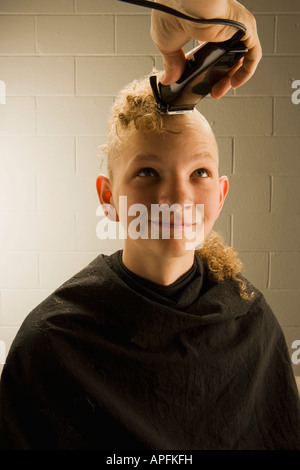 Getting hair buzzed off Stock Photo - Alamy