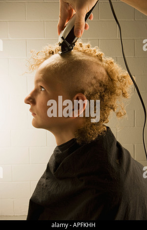 Getting hair buzzed off Stock Photo - Alamy