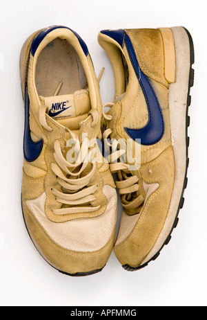 Pair of old worn Nike running Shoes Stock Photo - Alamy