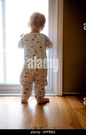 Toddler babygirl at home Stock Photo - Alamy
