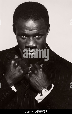 Nigel Benn, Britain's new WBO Middleweight boxing champion, kissing his ...