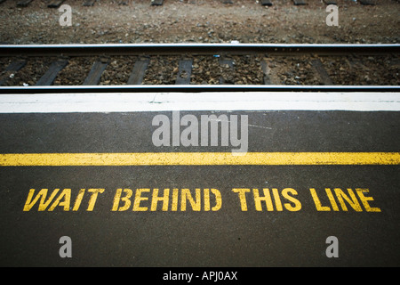 train station platform warning sign keep back from platform edge Stock ...