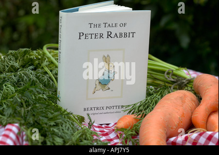 The Tale of Peter Rabbit by Beatrix Potter, and carrots Stock Photo - Alamy