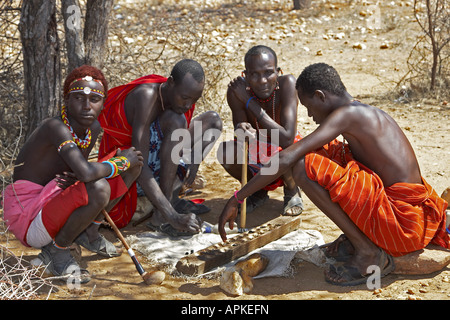 Men playing Kalah (Kalaha) (Mancala), a game in the mancala family ...