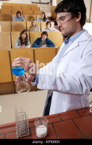 Teenage Students Sitting Examination With Teacher Invigilating Stock ...