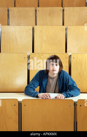 Teenagers in casual clothes looking at camera on pink background Stock ...