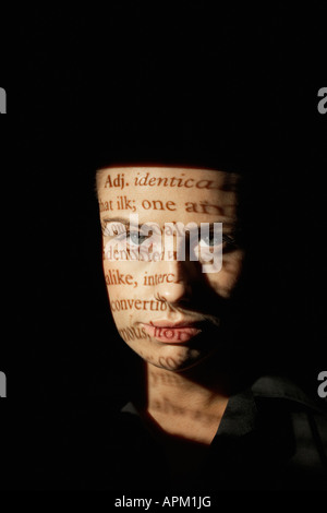Text projected on woman's face, eyes closed Stock Photo - Alamy