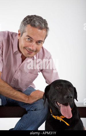 A white labrador grinning at the camera Stock Photo - Alamy