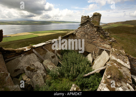 Deserted cottage over looking the Eynhallow Sound Rousay Orkney ...