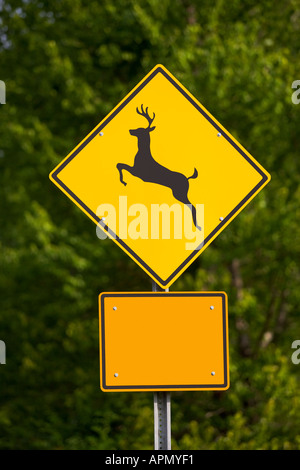 Deer crossing warning yellow sign, California USA. Wild animals xing ...