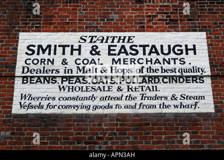 Old corn and coal merchant sign on building end Beccles, Suffolk ...