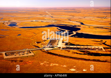 Oilfield pipeline on the Alaska north slope tundra with oil drilling ...