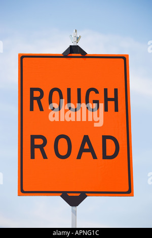 Rough road sign Stock Photo - Alamy
