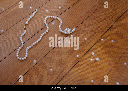 A Broken String of Pearls Stock Photo - Alamy