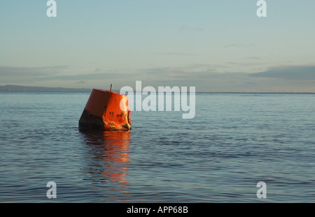 Buoy floating off Penarth beach Stock Photo - Alamy