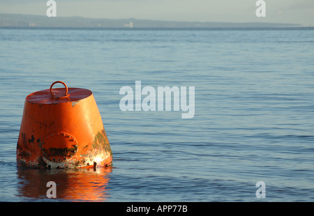 Buoy floating off Penarth beach Stock Photo - Alamy