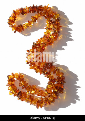 symbol made with Amber Beads Stock Photo - Alamy