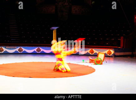 Clown spinning plates Stock Photo - Alamy