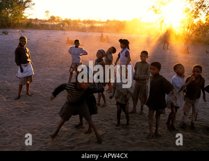 Bushman children playing in the sand Den ui village Bushmanland Namibia ...