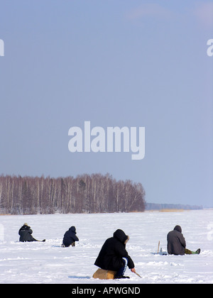 Ice fishing in Ural Mountains Russia Stock Photo - Alamy