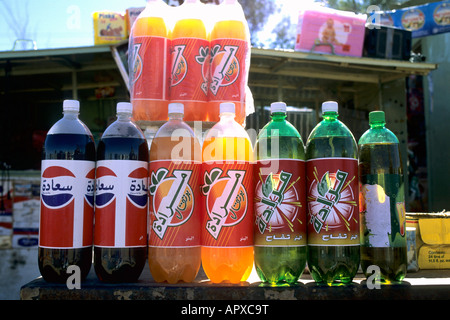 Fizzy carbonated soft drinks for sale in a shop. Sugary fizzy drinks ...