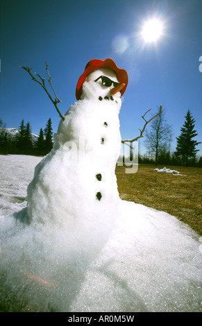 Melting Snowman in spring time Southcentral Alaska Stock Photo - Alamy