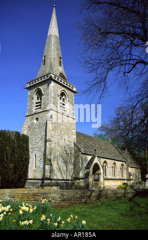 Weathered yellow stone picturesque church facade Stock Photo - Alamy