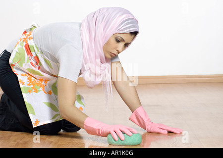 Cleaning lady, floor cleaning Stock Photo - Alamy
