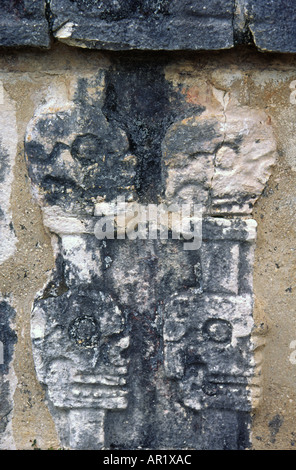 Skull carvings on the Tzompantli platform in the Mayan ruins of Chichen ...