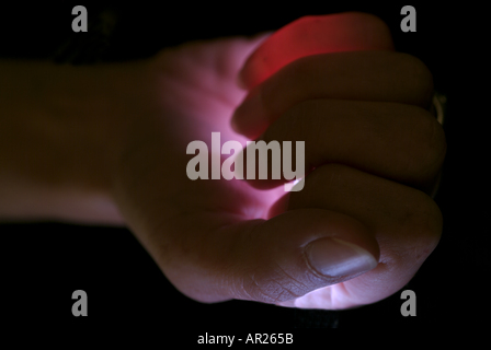 Light captured in a closed children hand Stock Photo - Alamy
