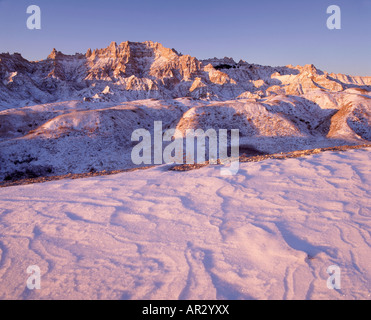 badland formations and snow, Badlands National Park, South Dakota Stock ...